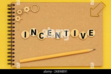 Incentive Word Written In Wooden Cube Stock Photo - Alamy