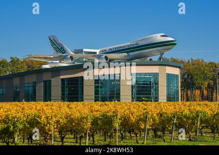 A Boeing 747-100 is mounted on building roof at Evergreen Aviation ...