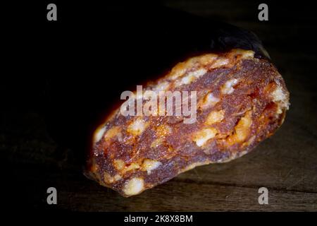 soppressata salami traditional calabrese salami in dark light Stock ...