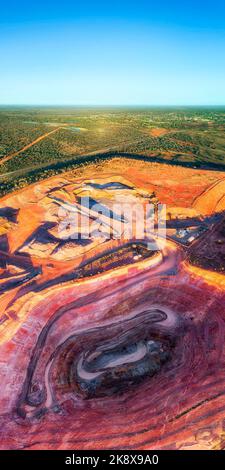 Bottom of open pit copper mine in Cobar town of Australa - aerial top ...