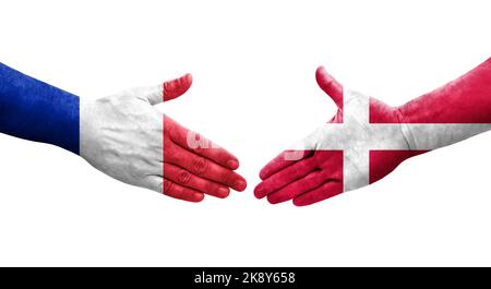 Handshake between france and denmark flags painted on hands ...