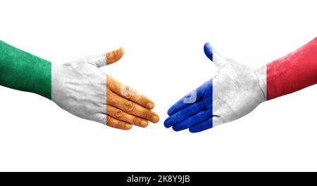 Handshake between ireland and france flags painted on hands ...