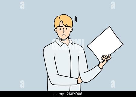 Unhappy young man stand with white paper document. Dissatisfied ...