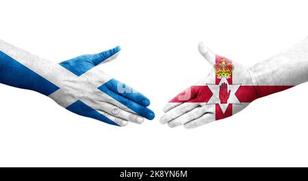 Handshake between Ireland and Scotland flags painted on hands, isolated ...