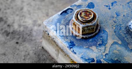 Strong large bolt and nut securing metal to ground strength Stock Photo ...