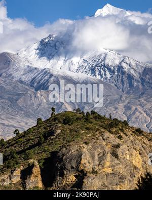 A vertical shot of the beautiful Nilgiri and Annapurna mountain ranges in the Himalayas, Nepal ...