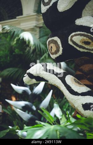 A vertical shot of the beautiful snake statue in the Bellagio ...