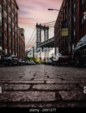 A vertical ground level shot of a bridge at night Stock Photo - Alamy