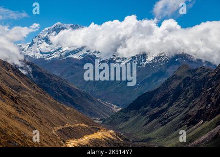 A high-angle of snowy ridged Kala Patthar, Sikkim, India, sunlit ...