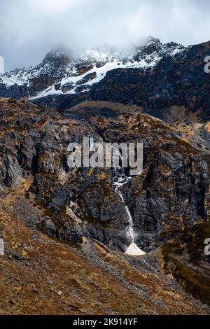 A high-angle of snowy ridged Kala Patthar, Sikkim, India, sunlit ...