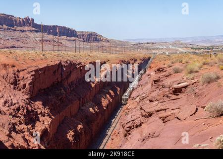 A train hauling a load of potash from a mine near Moab, Utah, makes a ...