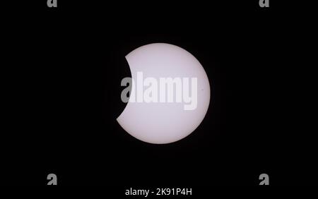 The partial solar eclipse of October 25, 2022 in Galati, Romania Stock ...
