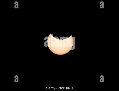 View of the partial solar eclipse in the sky over Yichun City ...