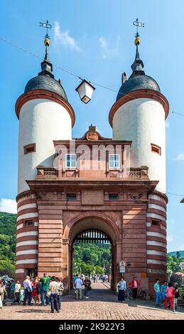 HEIDELBERG, GERMANY JULY 6, 2013: People watch the organ player in the ...