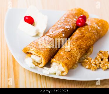 Bulgarian dish of pancakes palachinki with filling from brynza and ...