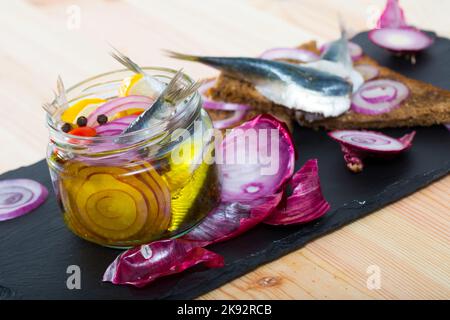 Fish dish - homemade pickling pilchards Stock Photo - Alamy