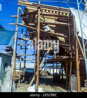 Sur, Oman - July 8, 1998: dhow shipyard in Sur, Oman. The sultan ...