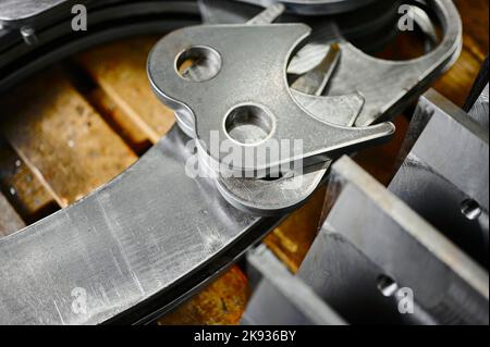 Processed metal plates with ground edges in warehouse Stock Photo - Alamy