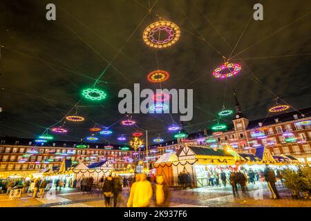 MADRID, SPAIN - DECEMBER 20: People have fun in Christmas time watching ...