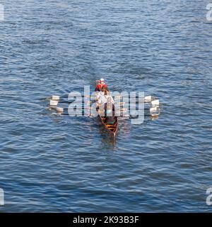 FRANKFURT, GERMANY - MARCH 2, 2013: A boat team trains at river main in ...