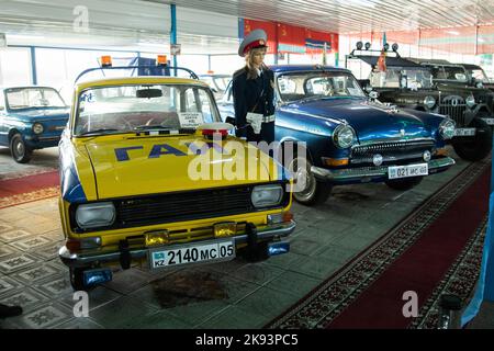Yellow Moskvich soviet car painted in the colors of the traffic police ...