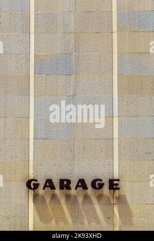 garage sign with shadow of letters Stock Photo - Alamy