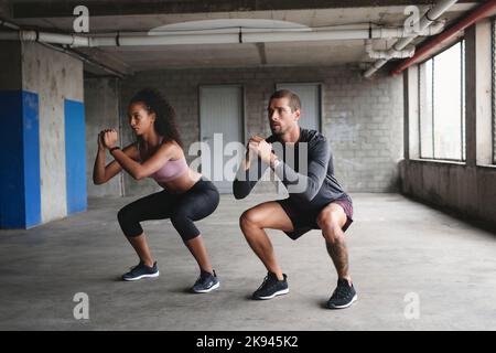 Were working on our core muscles today. Full length shot of a sporty ...