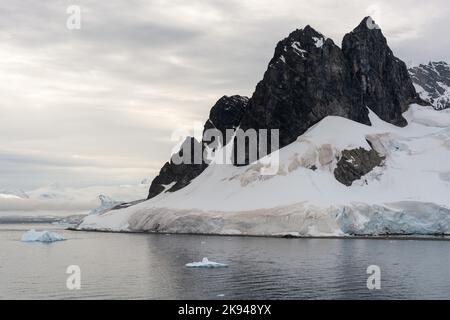 basalt rock towers of sable pinnacles from errera channel. antarctic ...