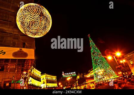 MADRID, SPAIN - DECEMBER 22: People have fun in Christmas time passing ...