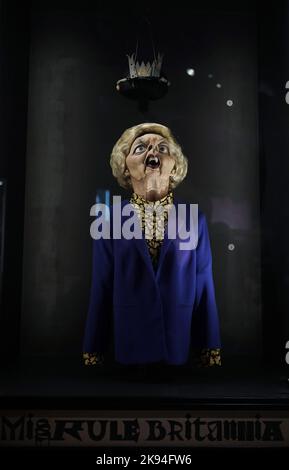 A Margaret Thatcher puppet from 'Spitting Image', 2020, is paired with ...