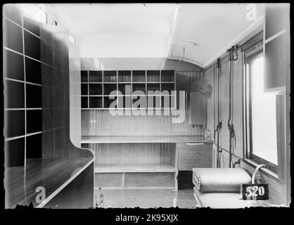 Interior in Norwegian mail car, sorting table. Norway's state banks ...