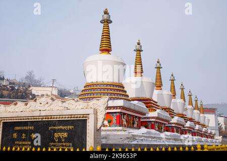 The Chorten stupas in Ta'er temple, Kumbum monastery with Tibetan snow ...