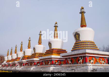 The Chorten stupas in Ta'er temple, Kumbum monastery with Tibetan snow ...