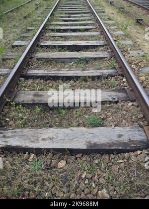 Railroad track with focus in the background Stock Photo - Alamy