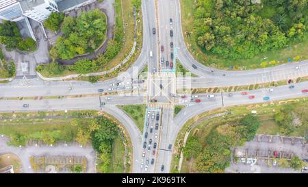 Traffic junctions, modern city. View from above to busy road junction ...