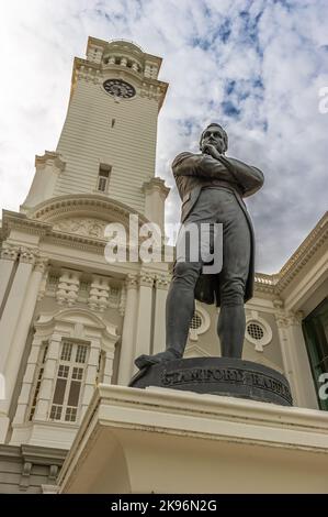 Bronze statue of Sir Stamford Raffles by Thomas Woolner in front of the Victoria Memorial Hall ...