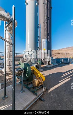 A processing station at an active solid waste landfill or dump, showing ...