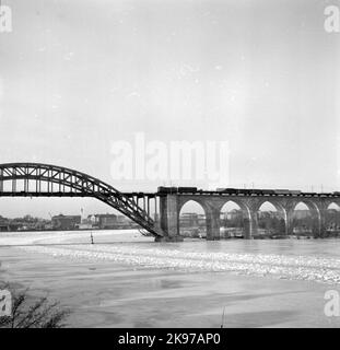 Freight trains pass the bridge Stock Photo - Alamy