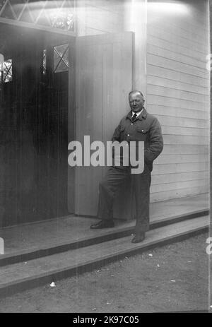 Exhibition man at the entrances Stock Photo - Alamy