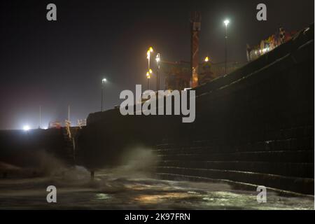 North Beach Harbour walls with incoming waves crashing into the sea ...