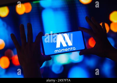 In this photo illustration, the Momenta logo is displayed on a ...