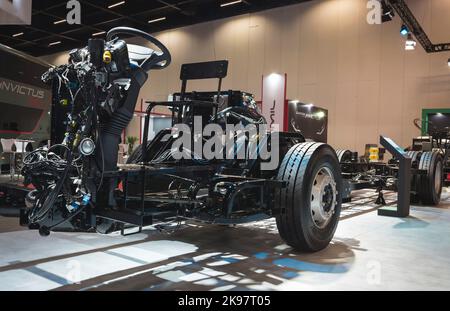 Exposed chassis, engine, gears and motor of a Mercedes-Benz bus on ...