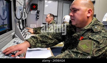 Russian operators conduct work during a Yars intercontinental ballistic ...