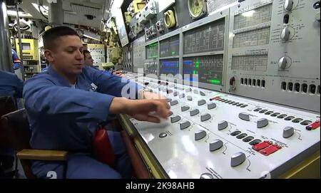 Russian operators conduct work during a Yars intercontinental ballistic ...