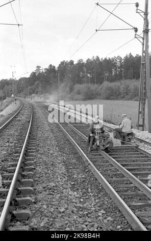 Rails and grinders change Stock Photo - Alamy