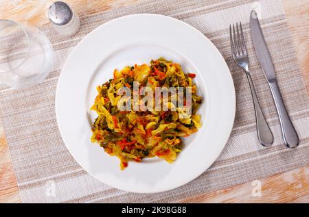 Spicy braised white cabbage as side dish or main course Stock Photo - Alamy