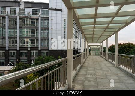 Inside of a modern overhead pedestrian bridge Stock Photo - Alamy