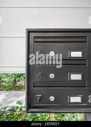 Mailboxes for letters and correspondence. Modern black mailboxes with ...