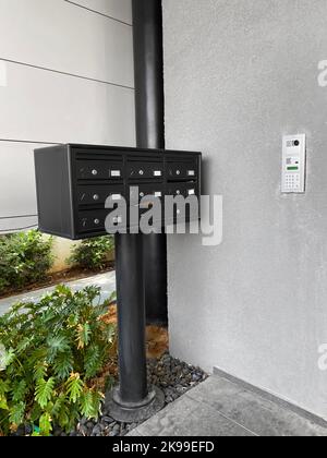 Mailboxes for letters and correspondence. Modern black mailboxes with ...