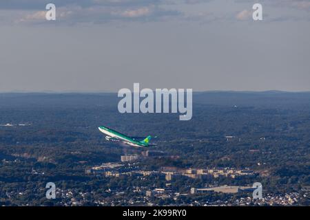 A closeup of an Aer Lingus Airbus 330 plane taking off from Boston on ...